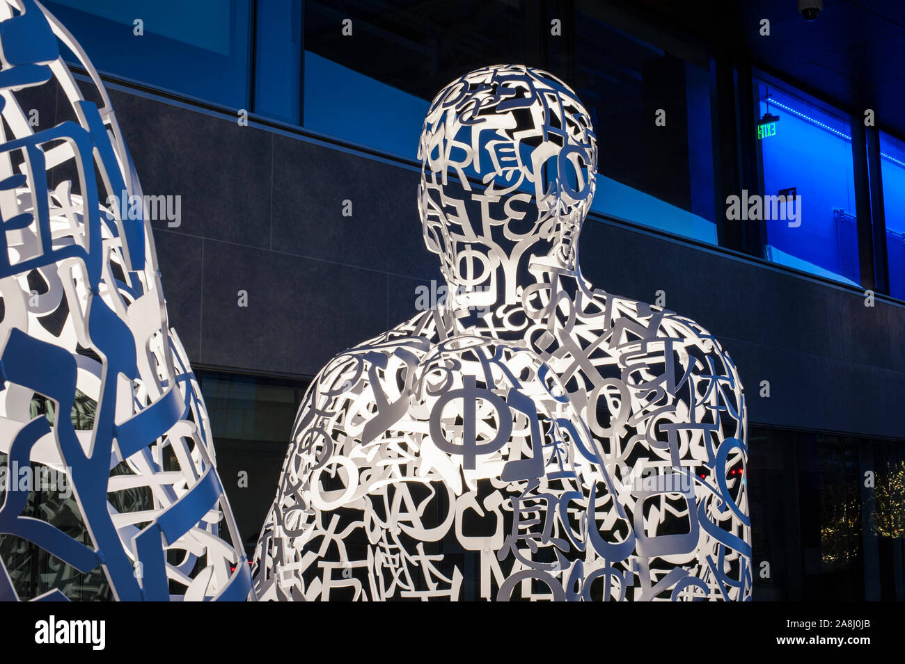 Paul Allen's Brain Science Institute with steel figures sitting face to ...