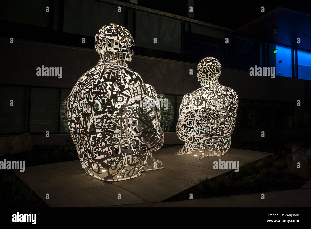 Paul Allen's Brain Science Institute with steel figures sitting face to ...