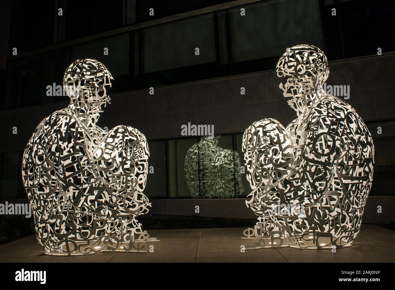 Paul Allen's Brain Science Institute with steel figures sitting face to ...