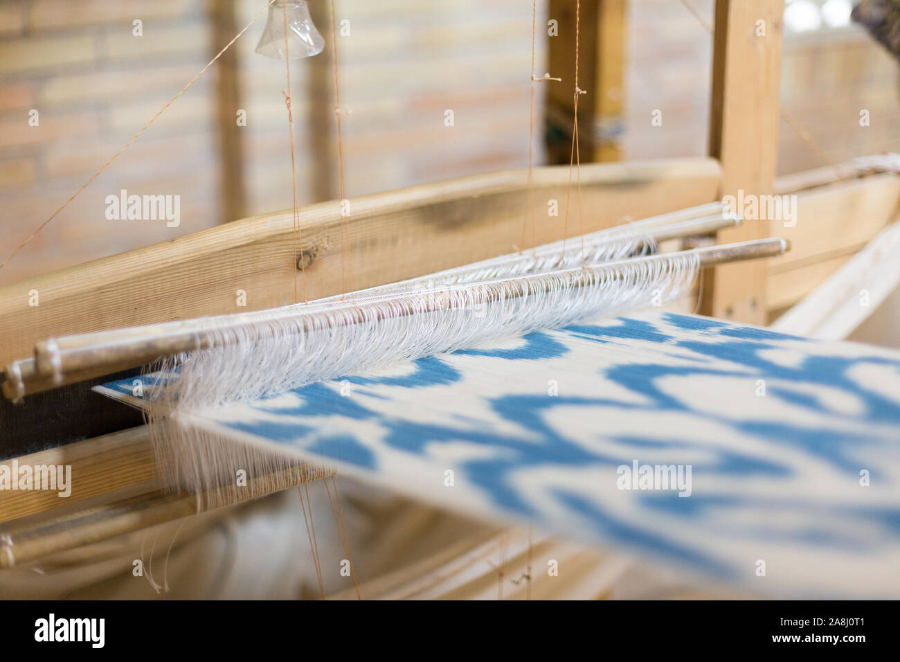 Woven traditional ikat fabrics Stock Photo - Alamy