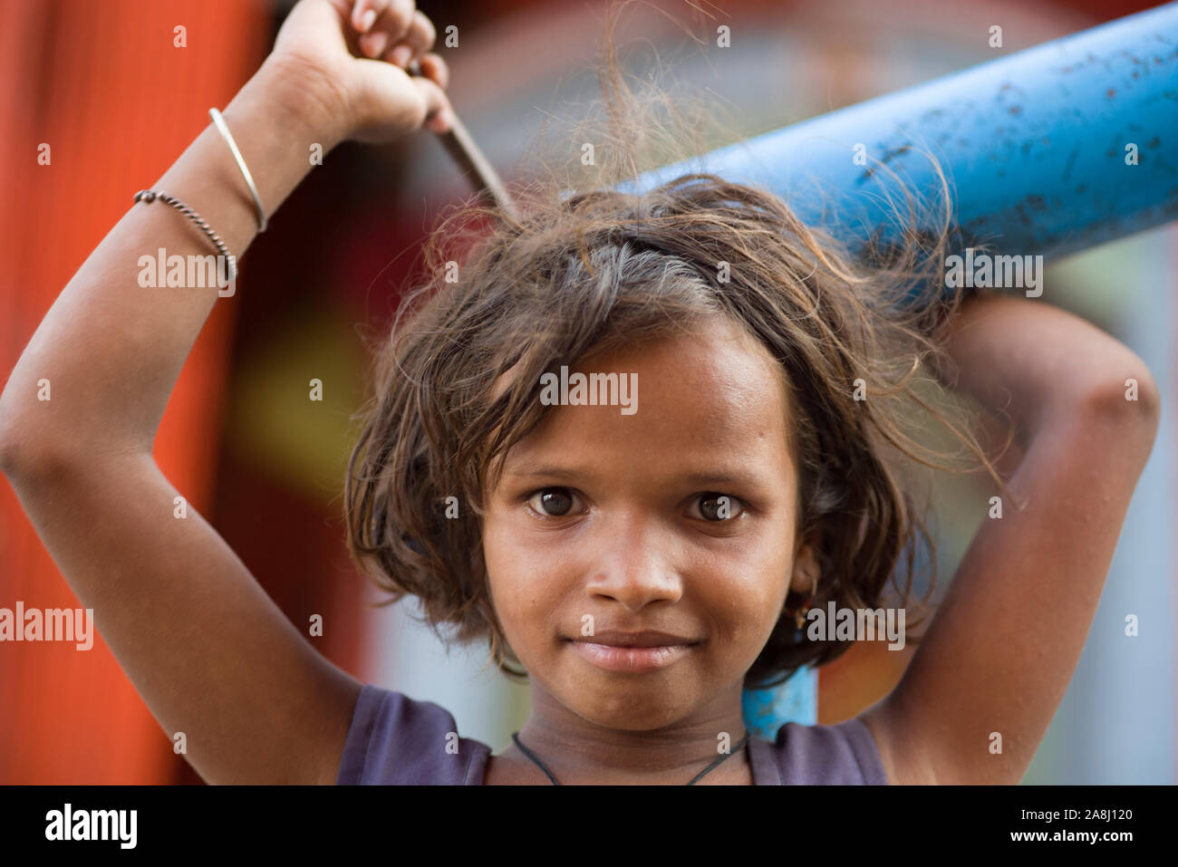 Varanasi, Uttar Pradesh, India - July 07, 2011: Sweet little indian ...
