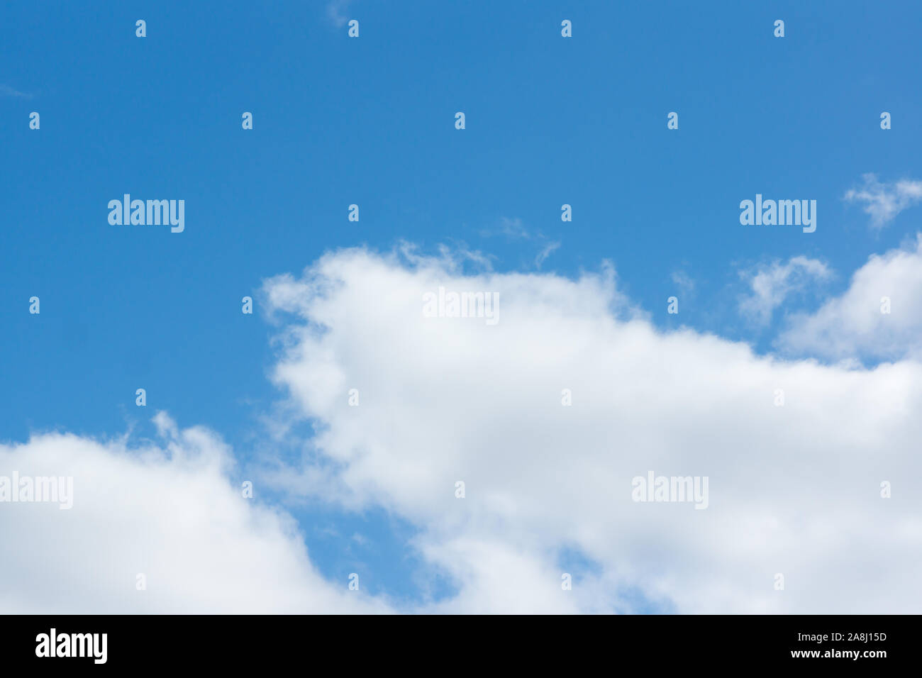 blue sky with flying white light clouds Stock Photo - Alamy
