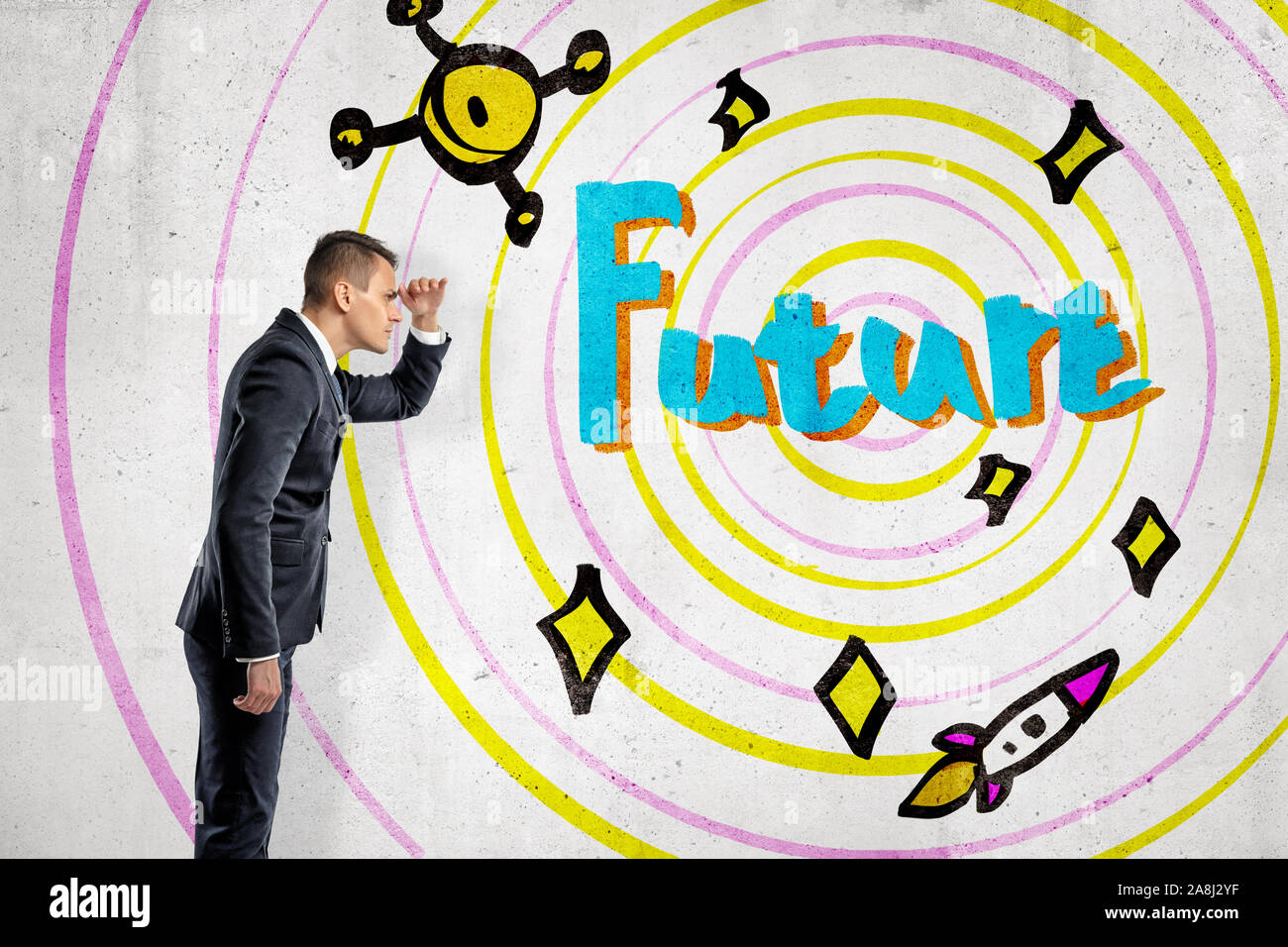 Young businessman looking in the distance at 'Future' sign on colorful ...