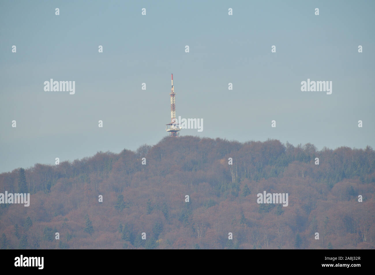 A view of a transmitter high in the mountains above a tree top Stock ...