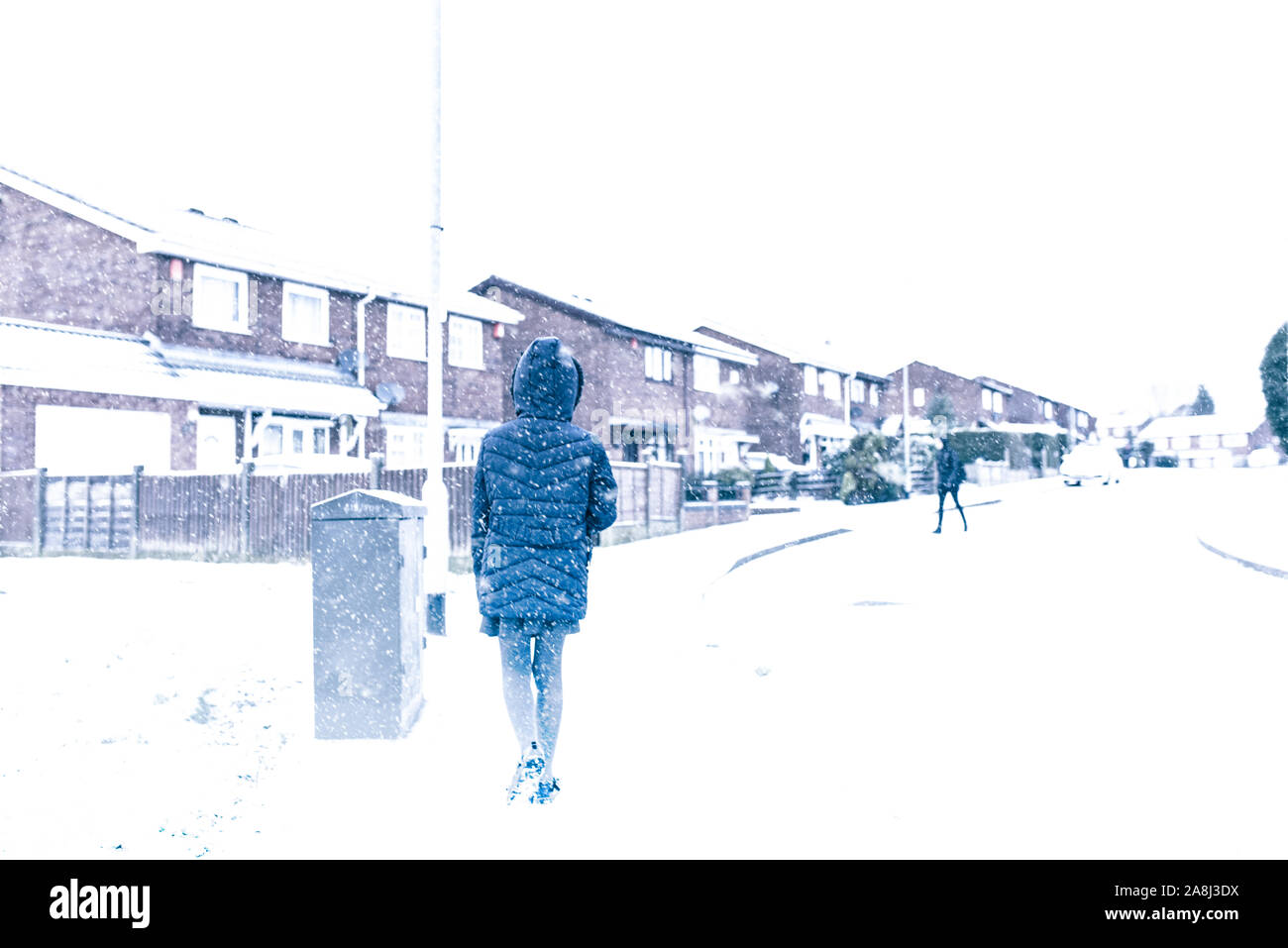 Child walking school in snow hi-res stock photography and images - Alamy