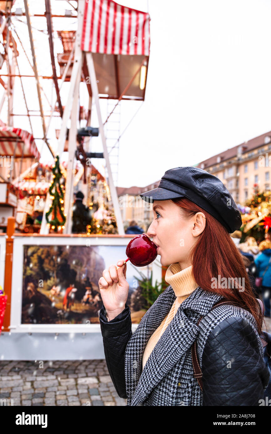Girl eating caramel apple hi-res stock photography and images - Alamy