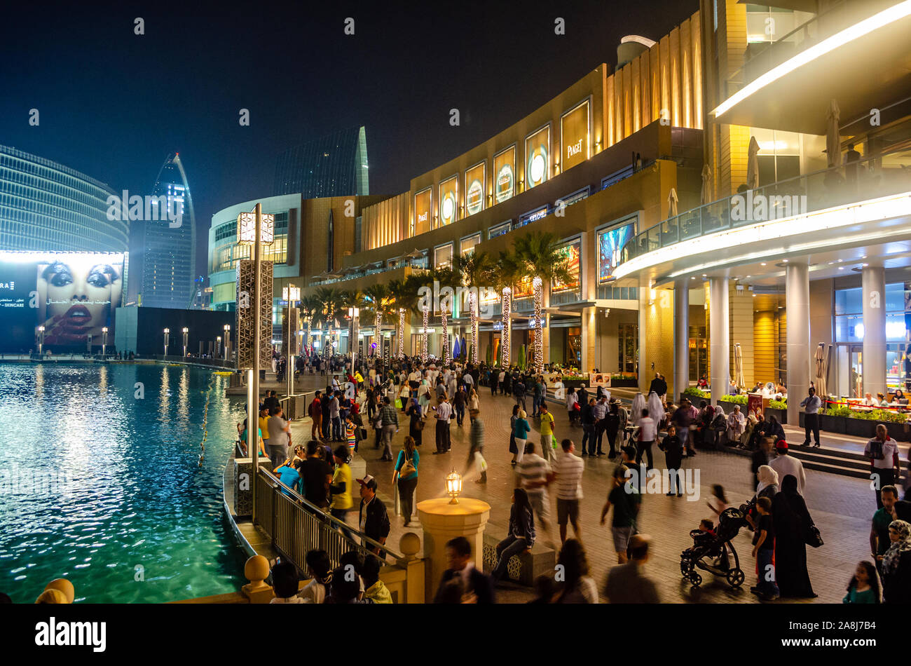 Tourists and visitors walking outside the Mall of Dubai, also known as ...