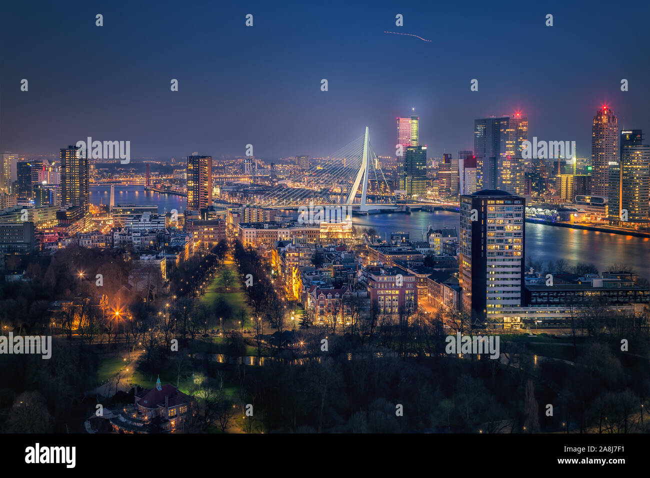 Rotterdam at night. Skyline and city lighs. Erasmus bridge and the ...