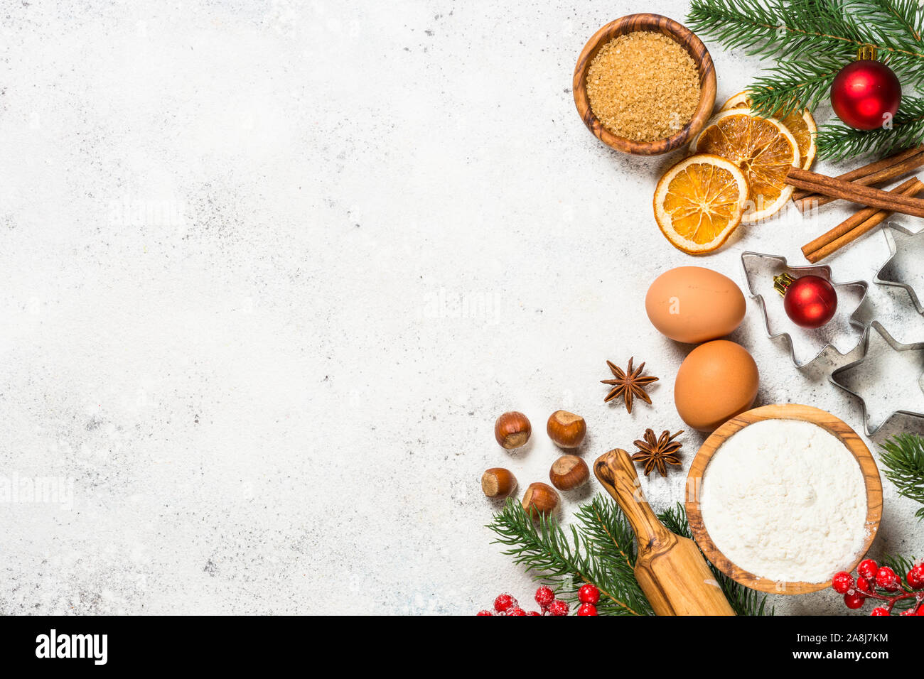 Christmas baking background on white table Stock Photo - Alamy