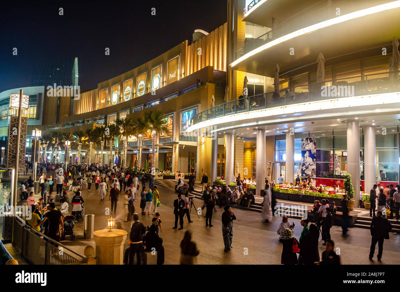 Tourists and visitors walking outside the Mall of Dubai, also known as ...