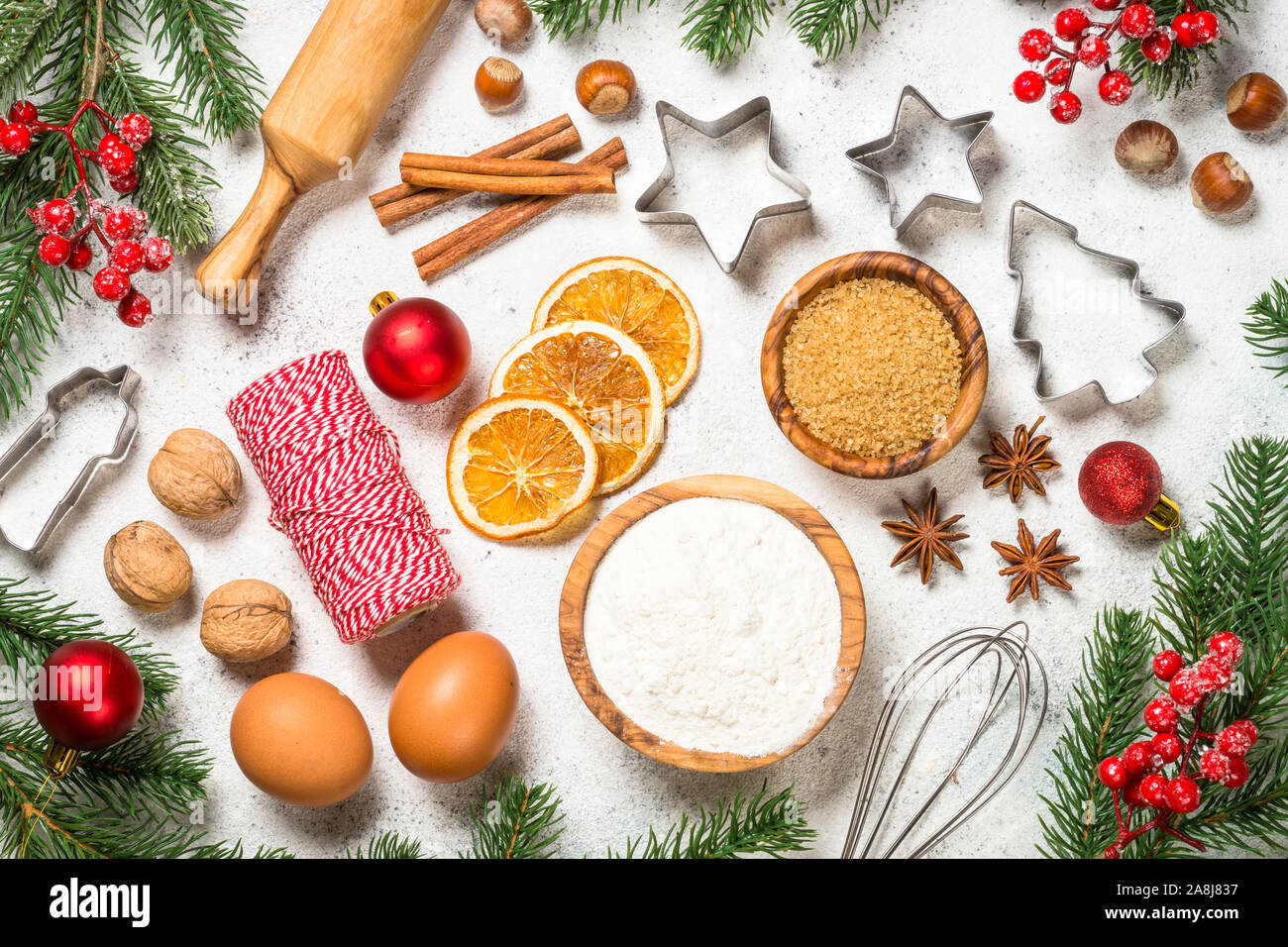 Christmas baking background on white table Stock Photo - Alamy