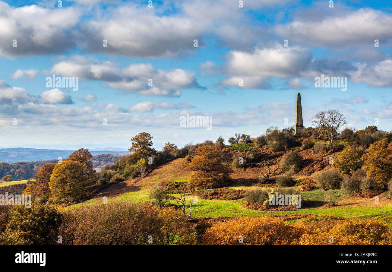 An autumn view of Eastnor castle Obelisk in the Malvern Hills, England ...