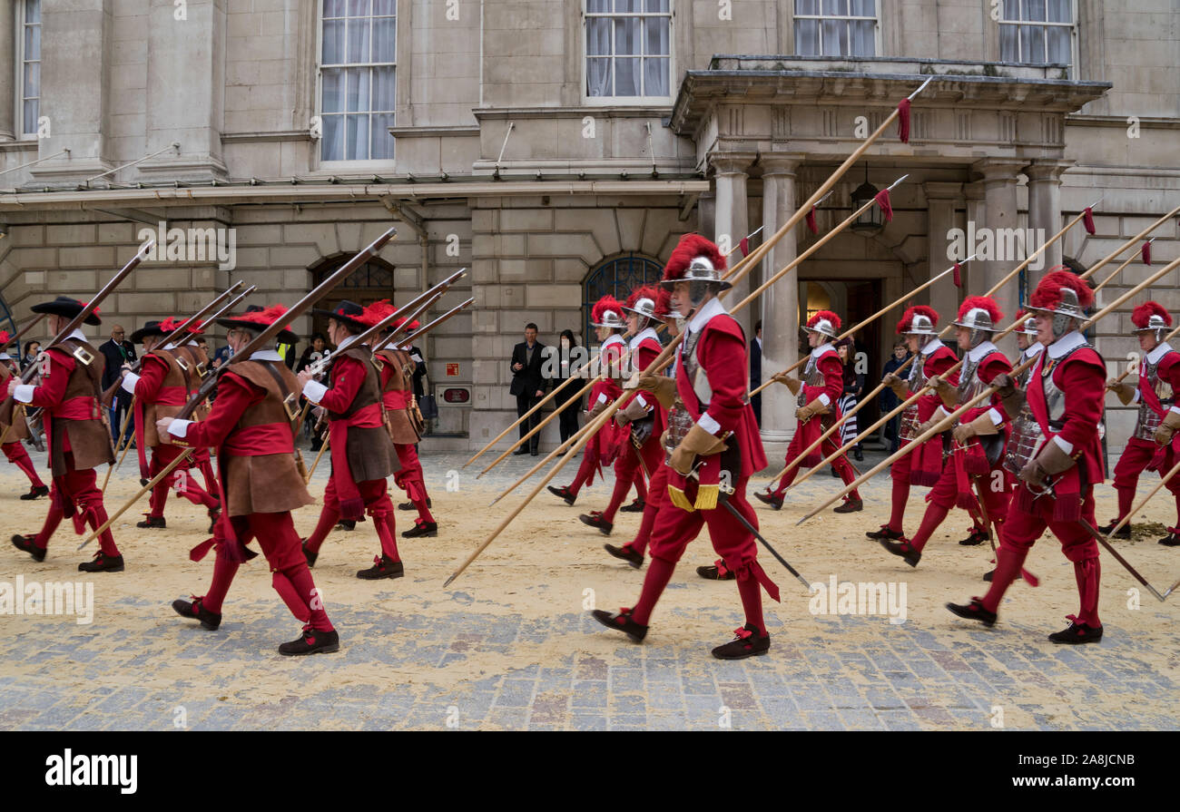 Guards in traditional costumes by the official carriage of the annual ...