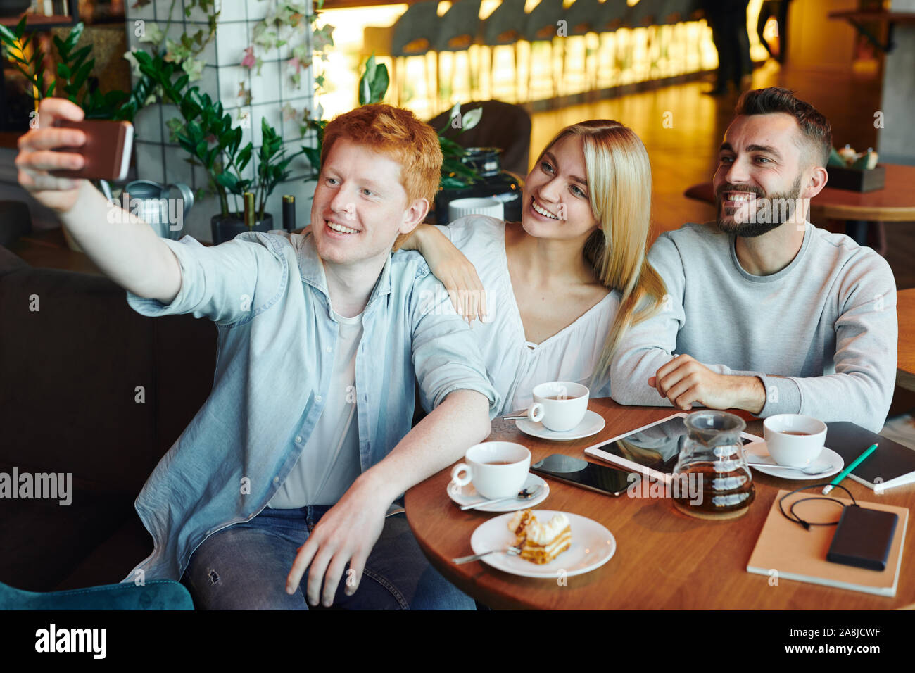Affectionate couple making selfie hi-res stock photography and images ...