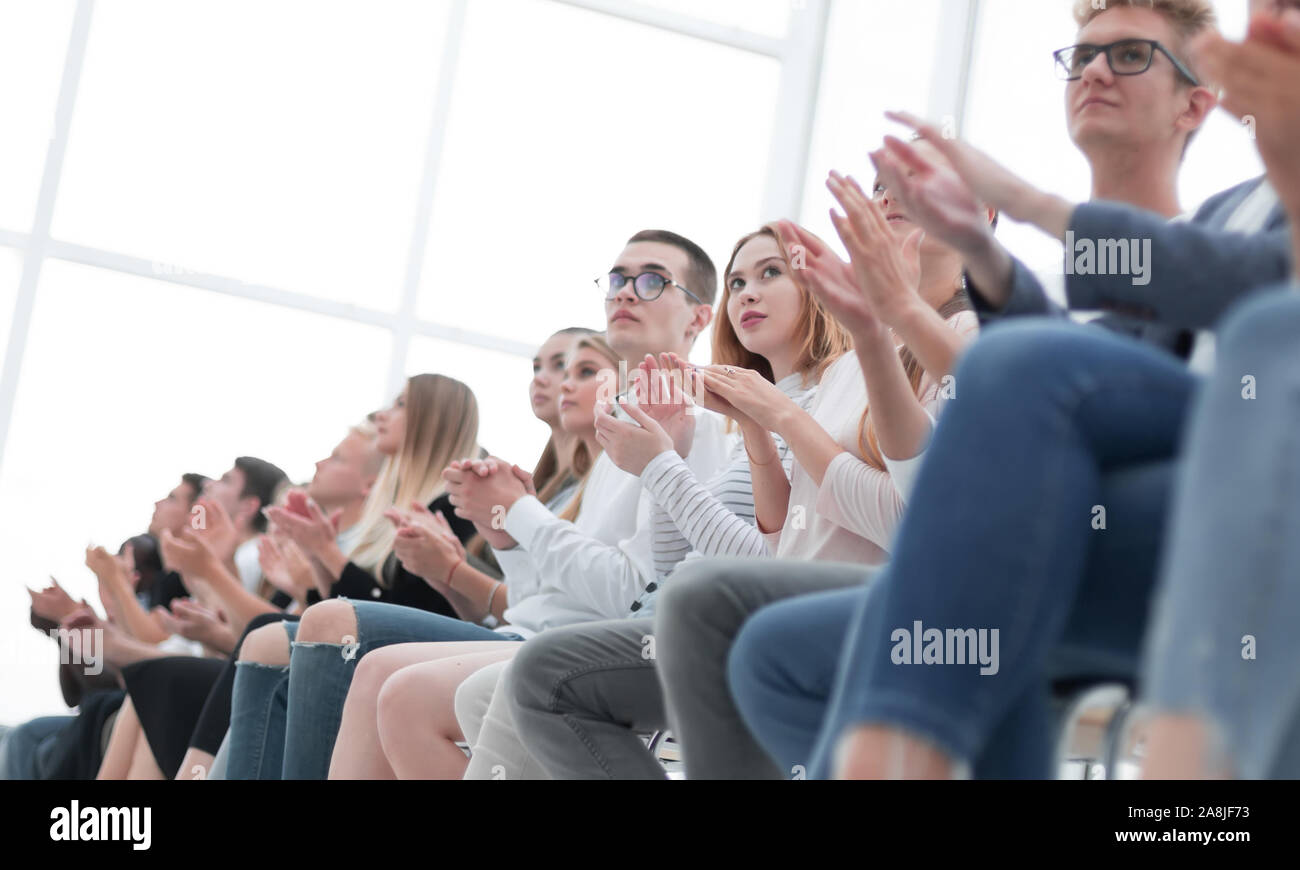 group of diverse young people sitting in a row Stock Photo - Alamy