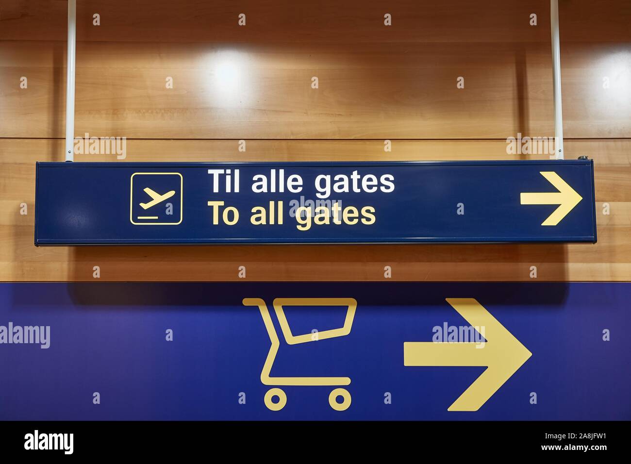 Airport terminal direction signs Stock Photo - Alamy