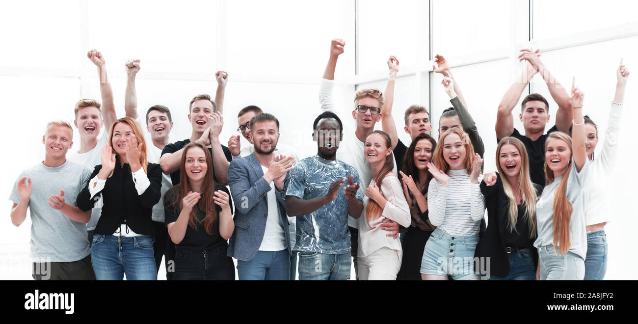 team of happy young people showing their success Stock Photo - Alamy