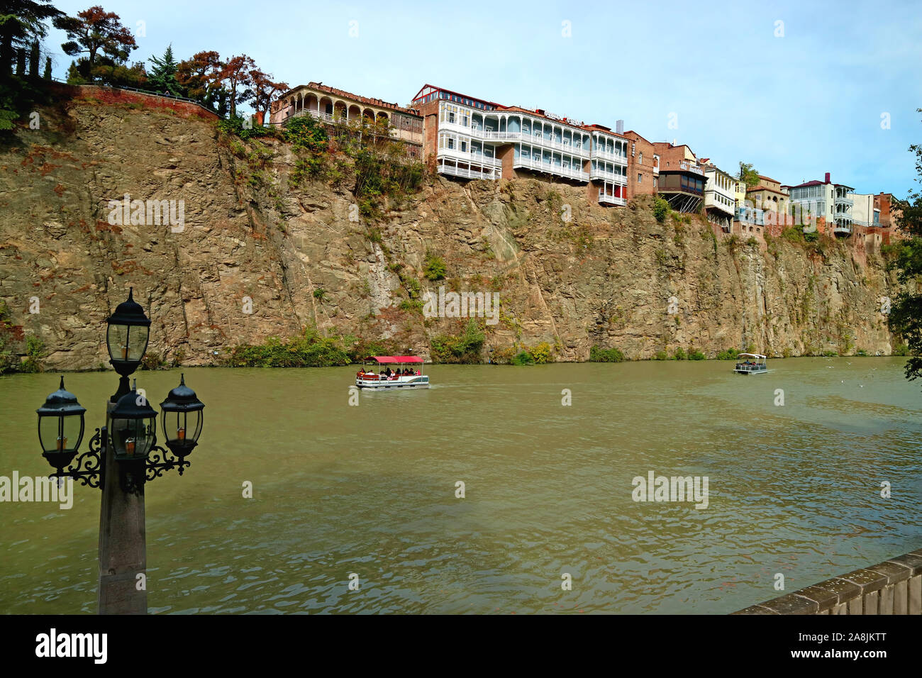 The old buildings on the cliff of Mtkvari river, the historic Metekhi ...