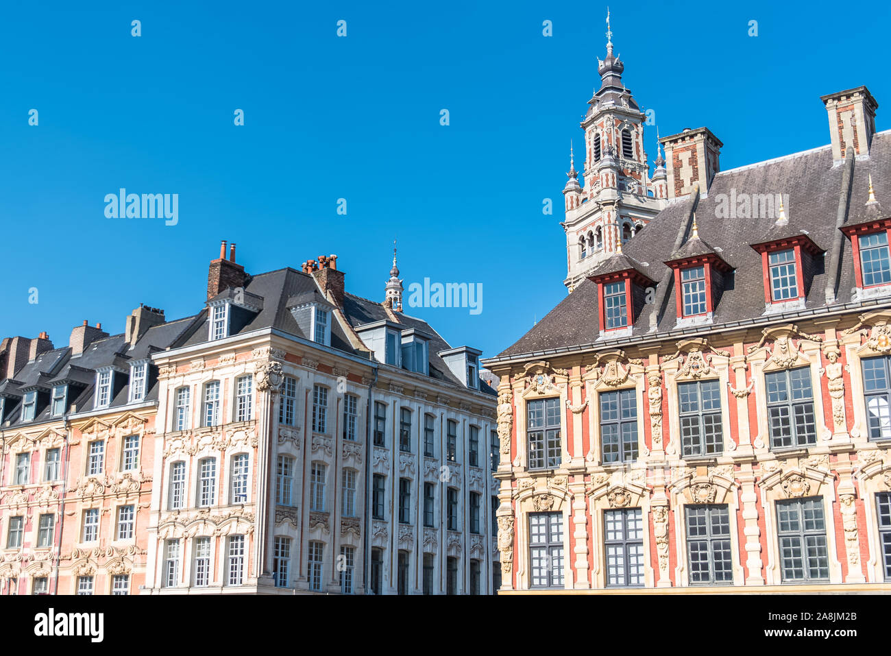 Lille, old facades in the center, the belfry of the Chambre de Commerce ...