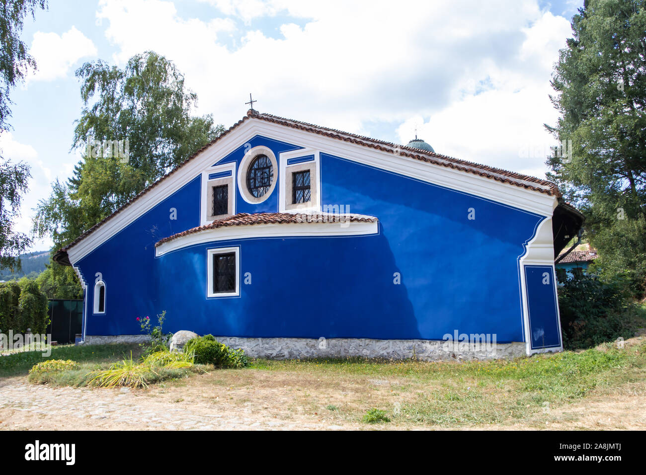 Old blue church in the city Stock Photo - Alamy