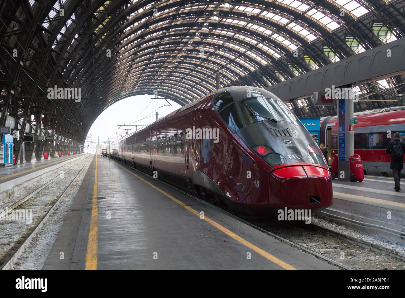 "Frecciarossa", a high-speed Italian train, poised at the Milan Central Station, a major railway ...