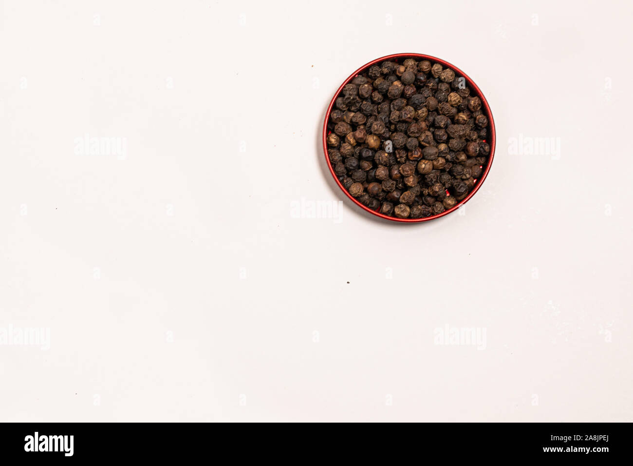 Composition with different spices, Cardamom. black pepper. Spherical ...