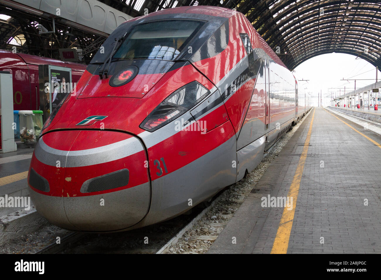 "Frecciarossa", a high-speed Italian train, poised at the Milan Central ...