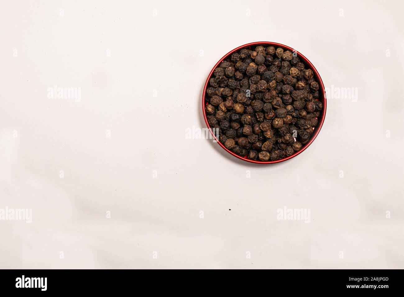 Composition with different spices, Cardamom. black pepper. Spherical ...