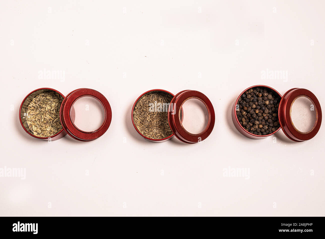 Composition with different spices, Cardamom. black pepper. Spherical ...