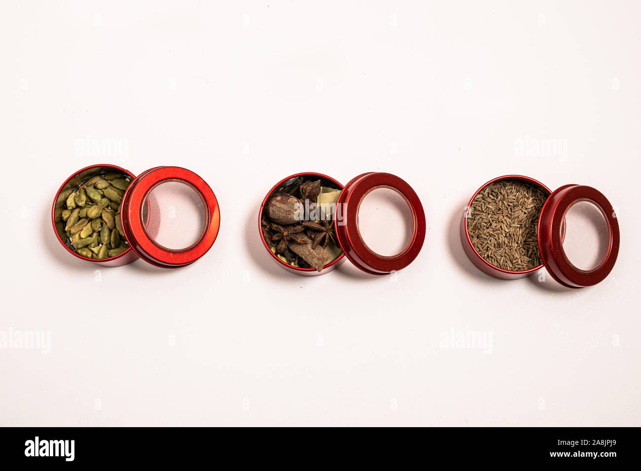 Composition with different spices, Cardamom. black pepper. Spherical ...