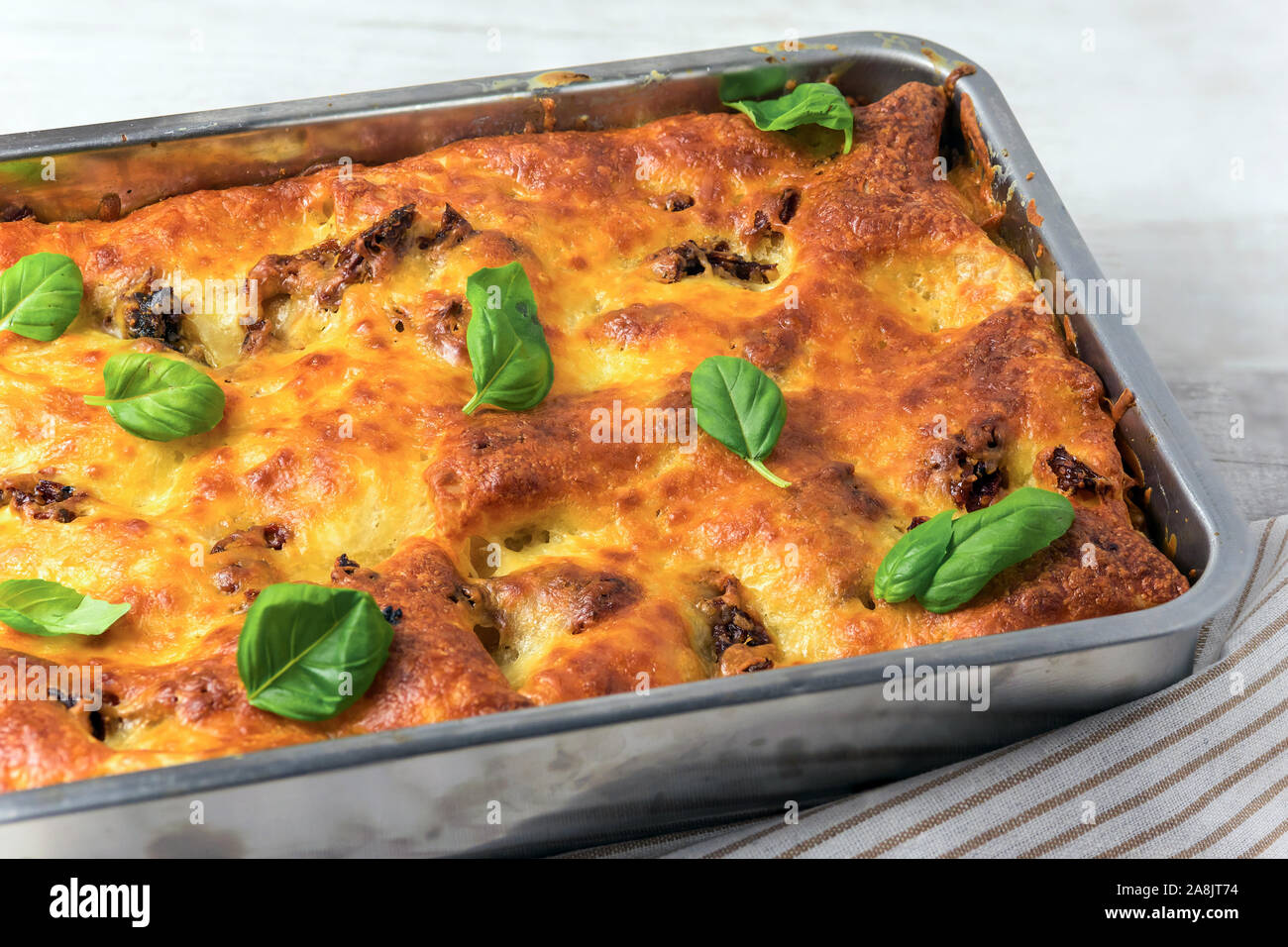 Homemade lasagne bolognese in metal baking form Stock Photo - Alamy