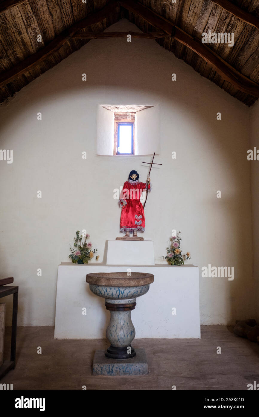 Stoup for holy water at the old adobe church of San Pedro de Atacama ...