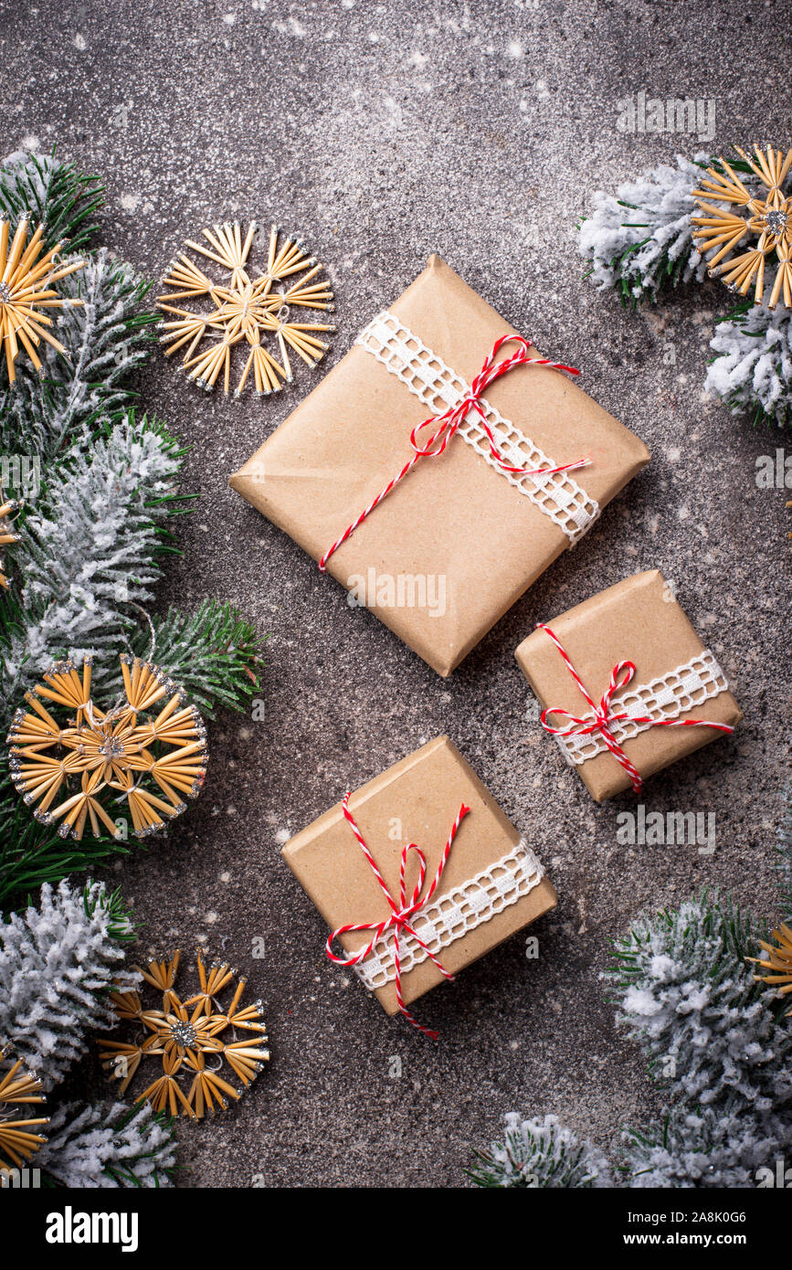Christmas gift boxes in craft paper Stock Photo - Alamy