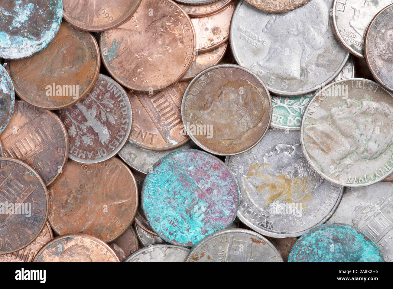 Dirty coins hi-res stock photography and images - Alamy
