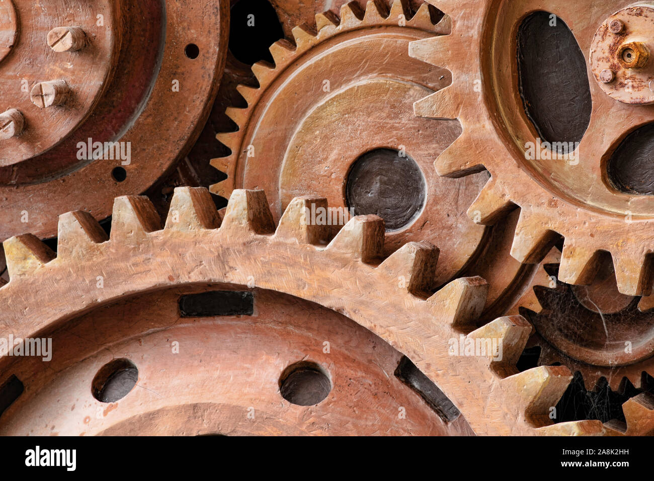 Grunge gears and wheels create an industrial steampunk background ...