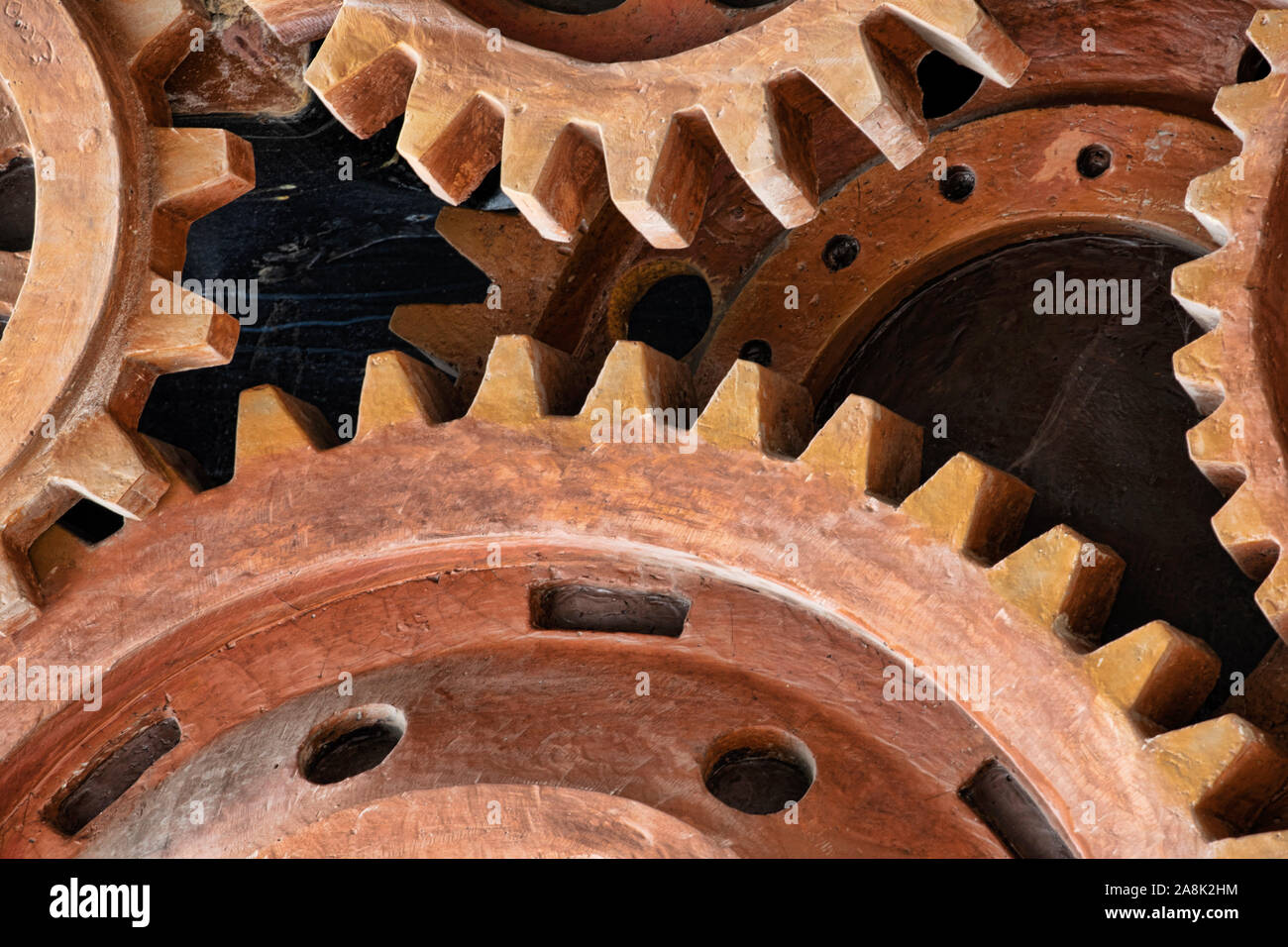 Grunge gears and wheels create an industrial steampunk background ...
