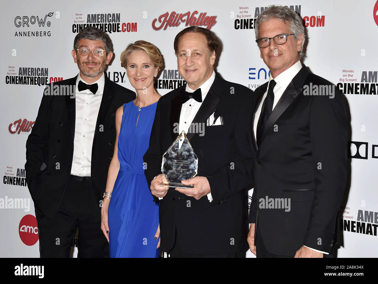 BEVERLY HILLS, CA - NOVEMBER 08: Eric Nebot, guest, Adam Aron and ...