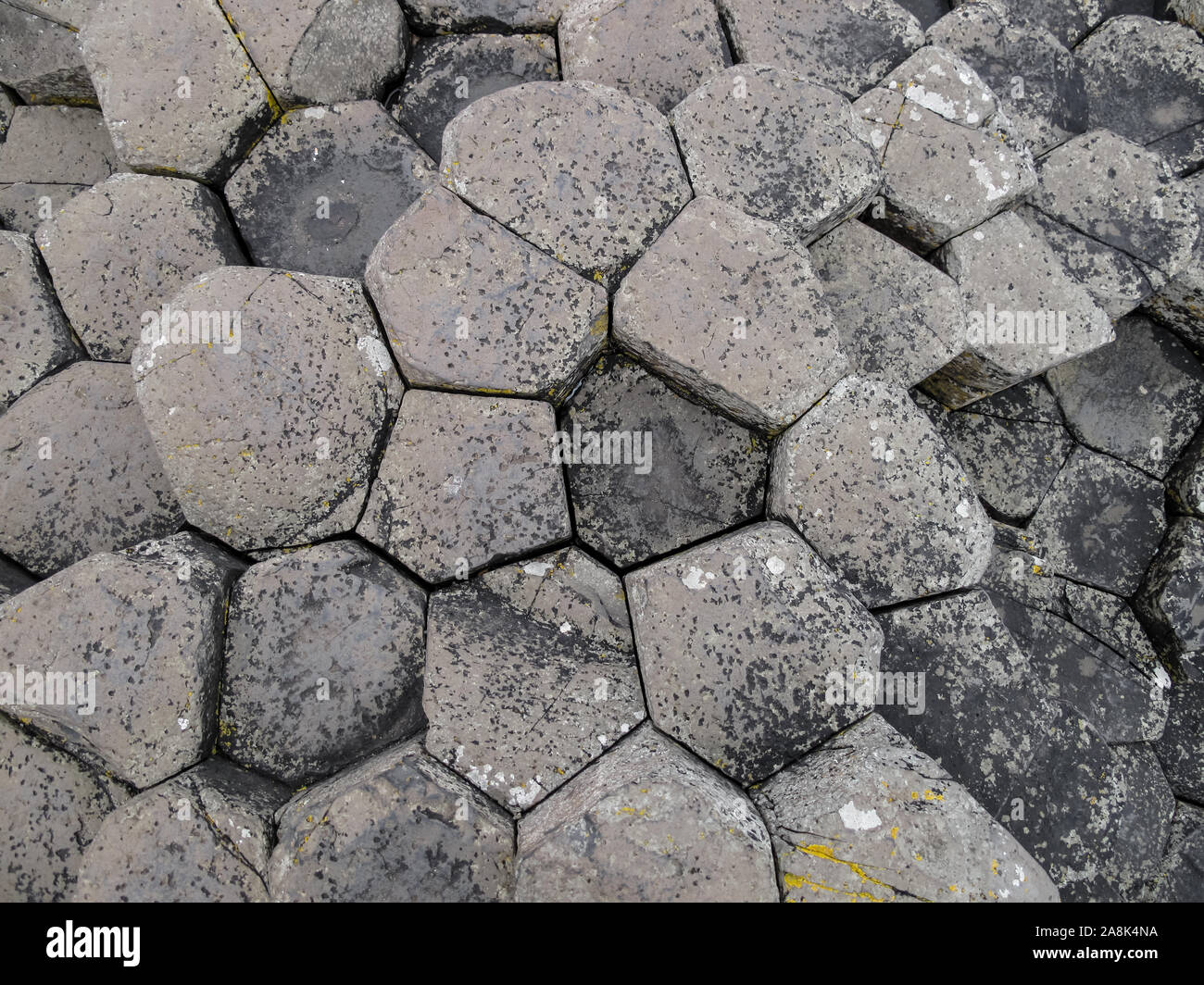 Aerial view pattern of hexagonal basalt columns on the Giants Causeway ...