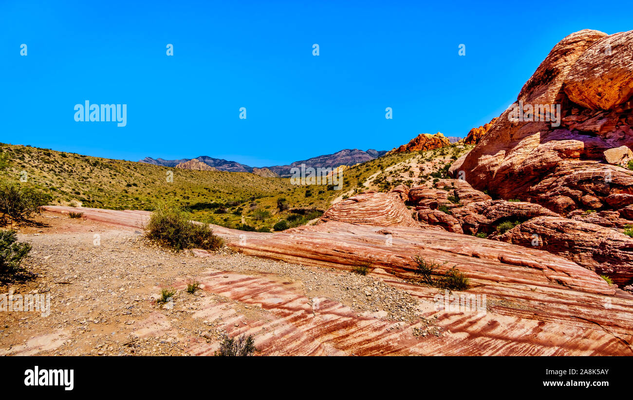 View of the Red and White layered Sandstone Rocks on the Trail to the ...