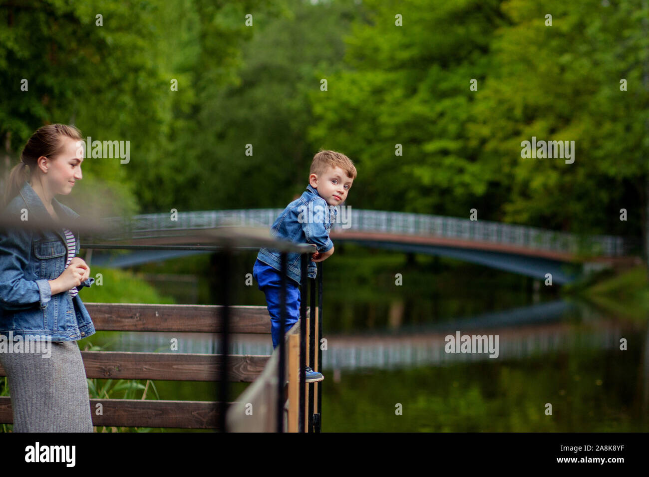 Mother is experiencing that the child will fall into the water. A ...