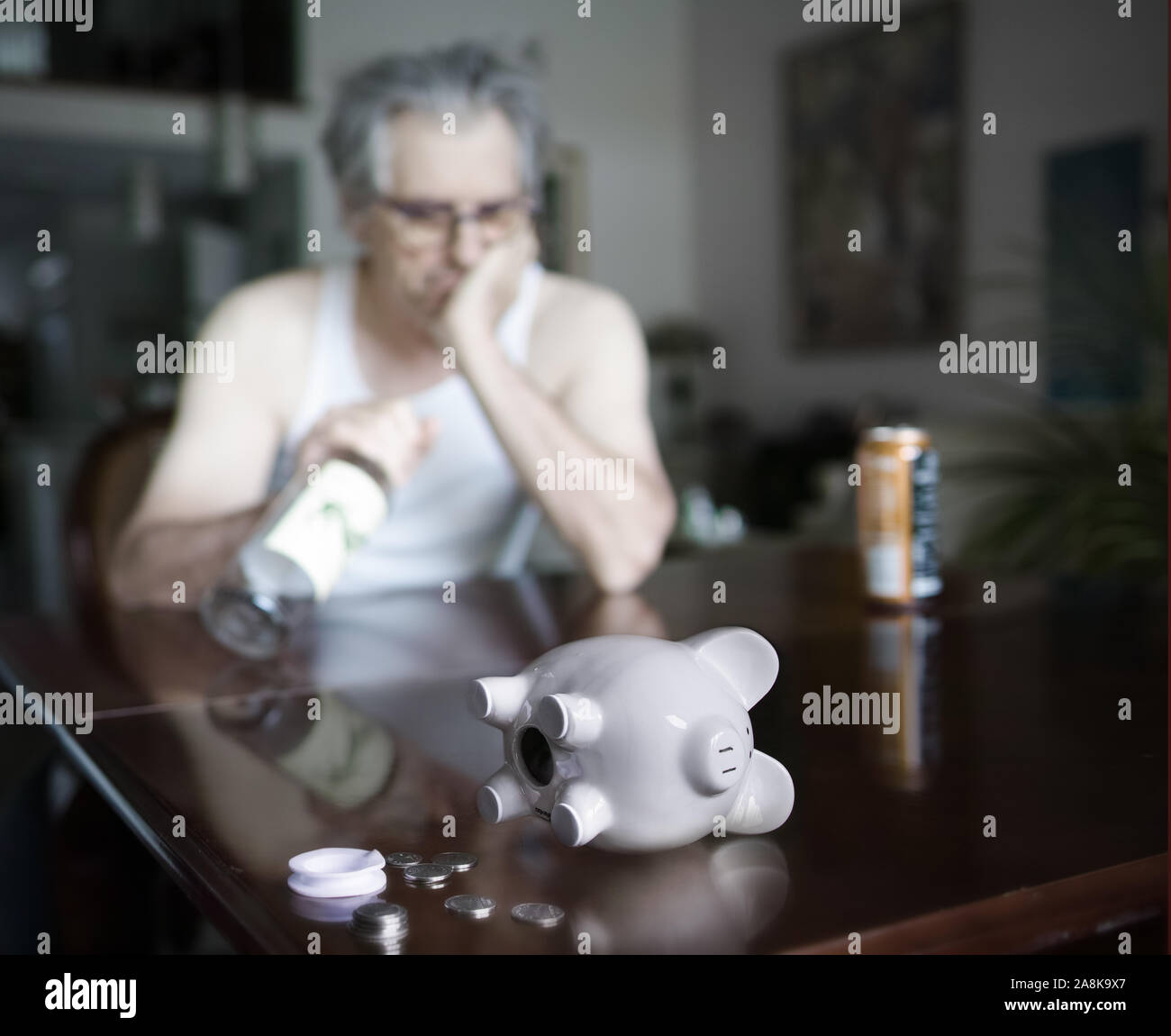 Man surrounded by money hi-res stock photography and images - Alamy