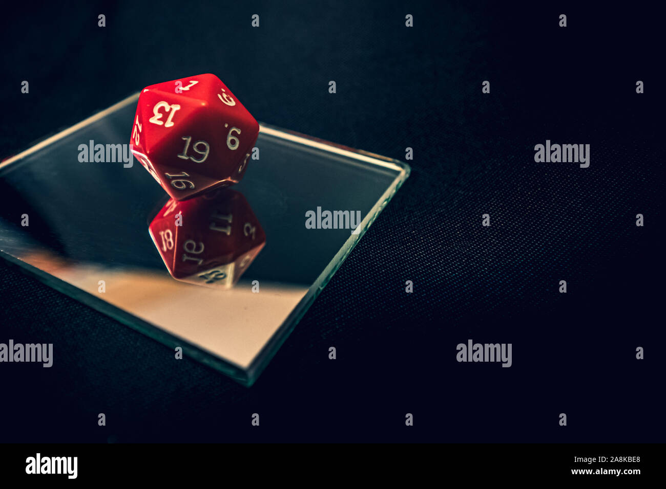 new 20 sided die with 1 faceing straight up Stock Photo - Alamy