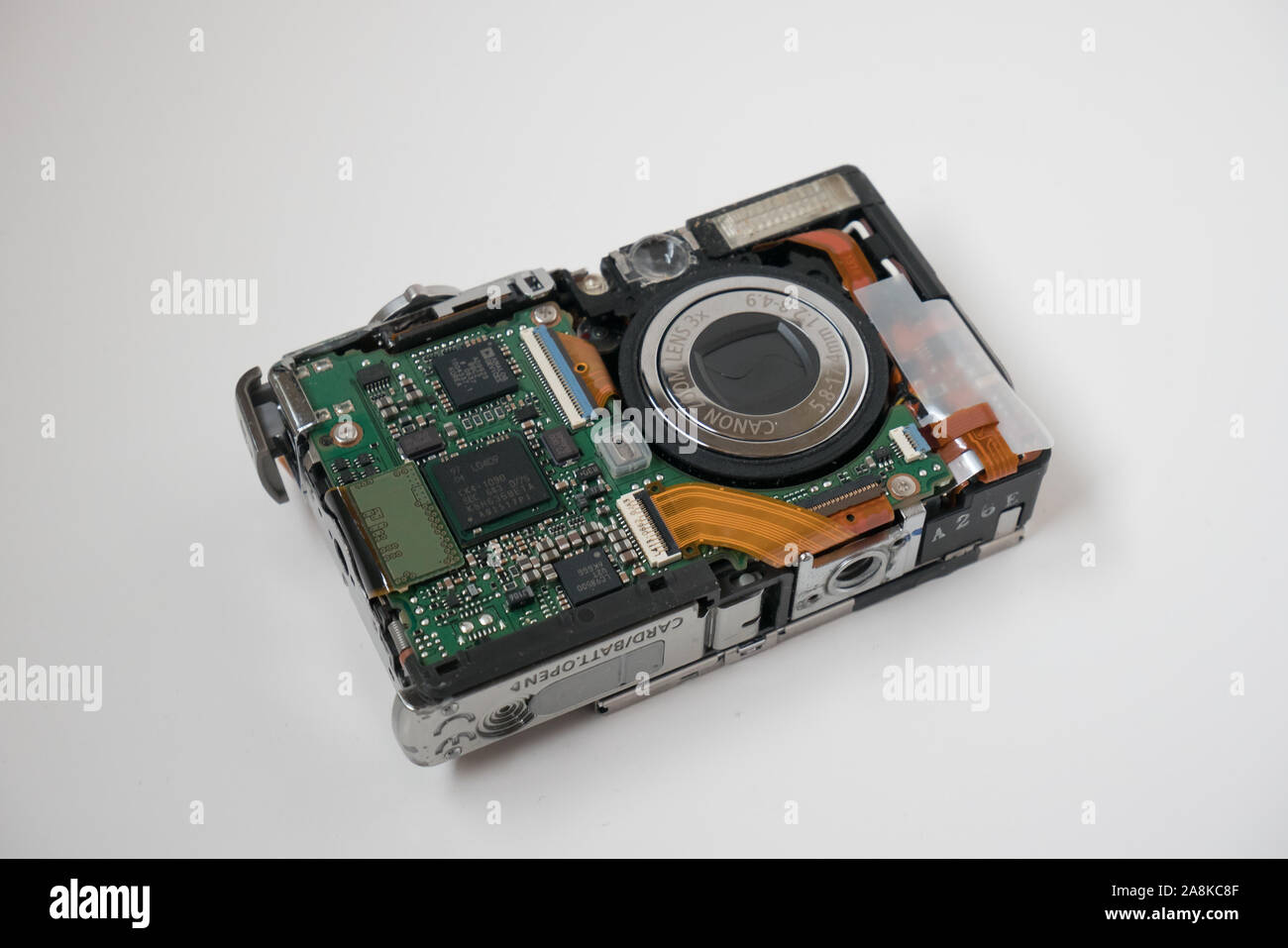 Disassembled digital camera exposing the electrical components inside ...