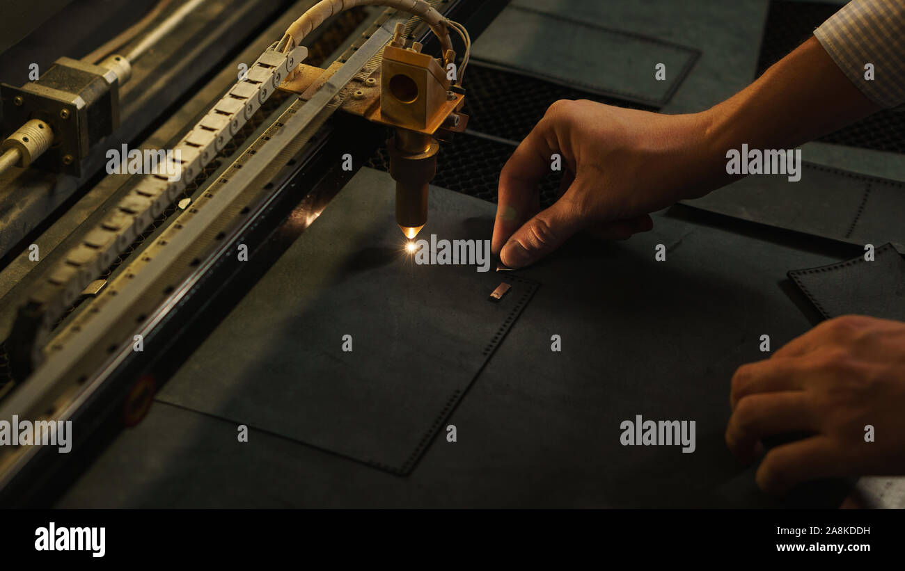 Laser cutting beam artificial leather High precision. Modern machine ...