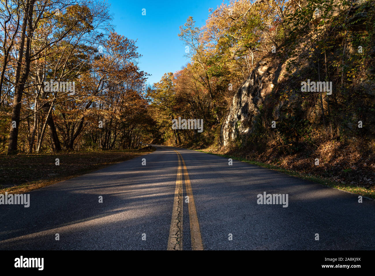 Vibrant colors in Blue Ridge Parkway roads during sunset at the Golden ...