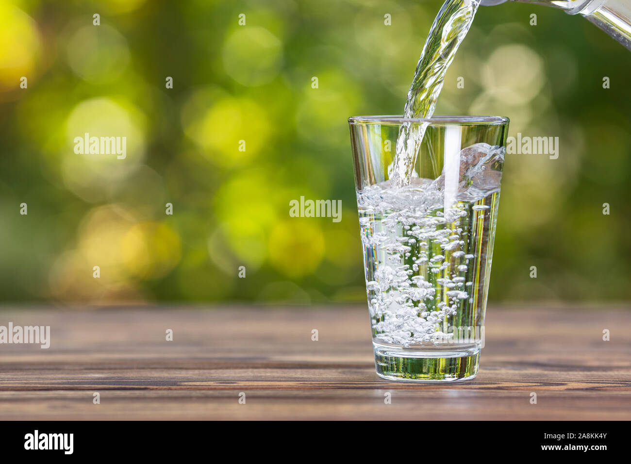 Pouring water pitcher spill hi-res stock photography and images - Alamy