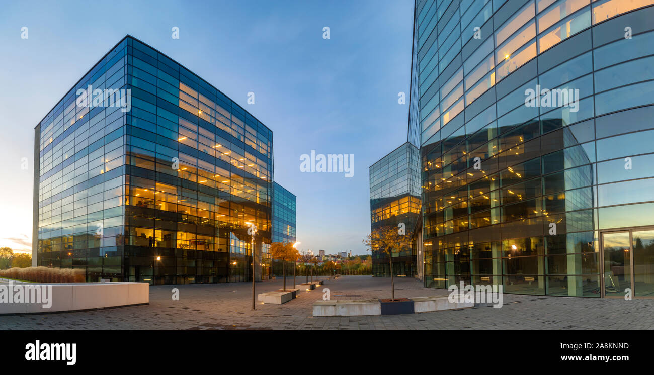 Modern office building in the evening Stock Photo - Alamy
