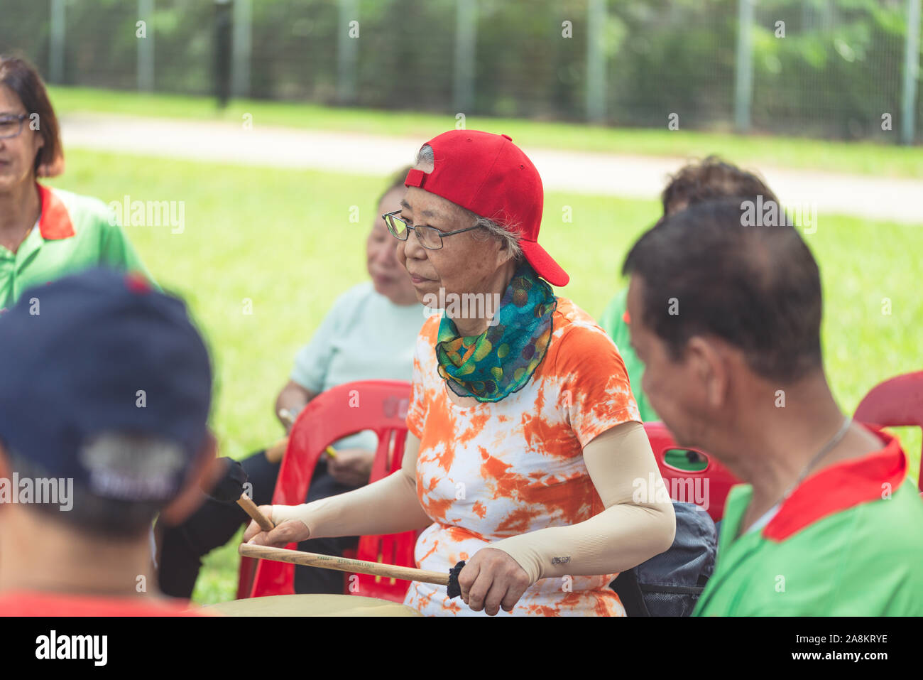 A group of seniors elderly retired active asian men women playing ...