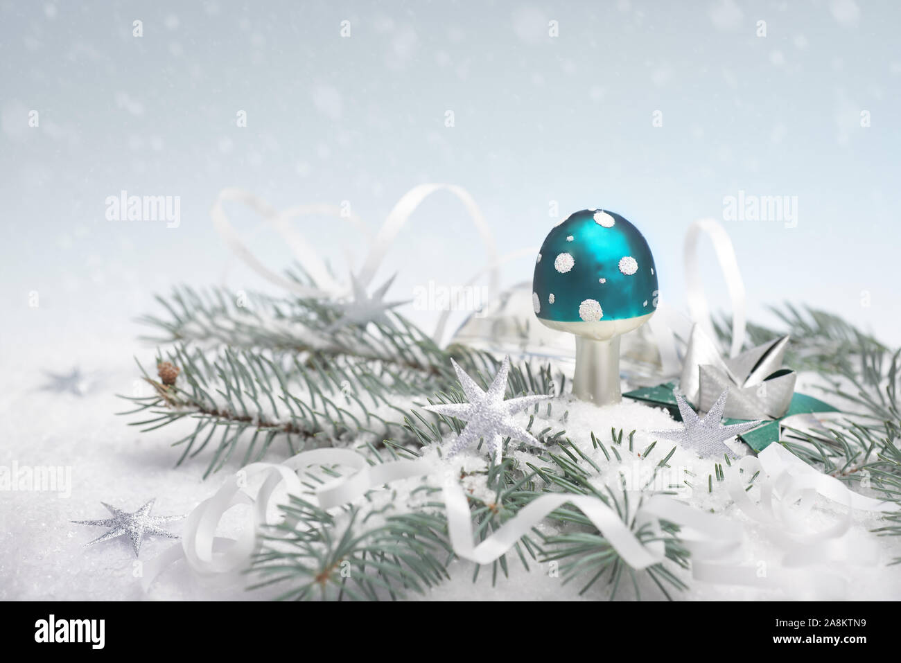 Turquoise metallic green blue mushroom magic toad stool and white paper ...