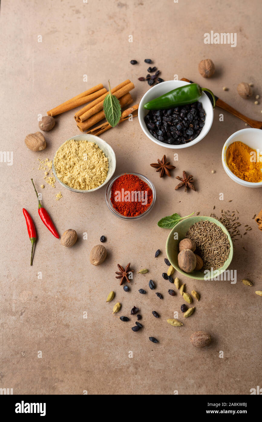 Various aroma spice and seasoning in small bowls , food background ...